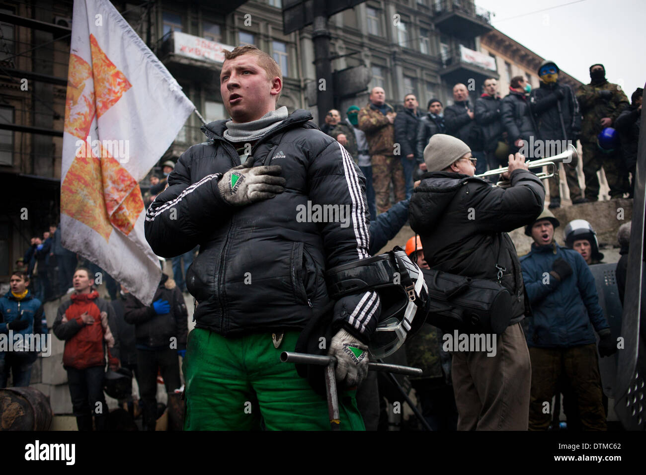 Kiev, Ukraine. 20th Feb, 2014. Protesters cheer while they managed to ...