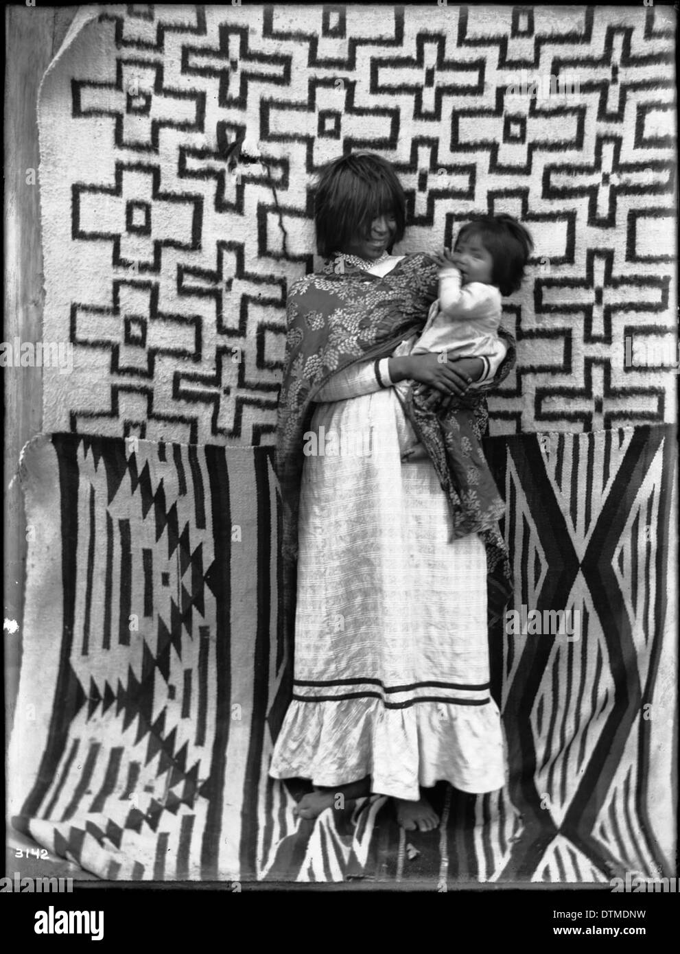 Young Walapai Indian mother with child in her arms, Hackbury, Arizona ...