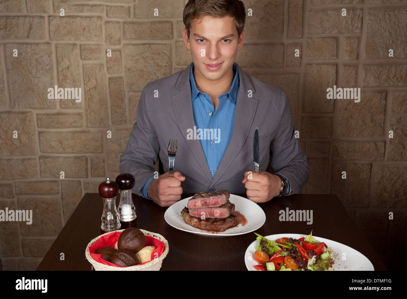 eat a beef steak Stock Photo - Alamy
