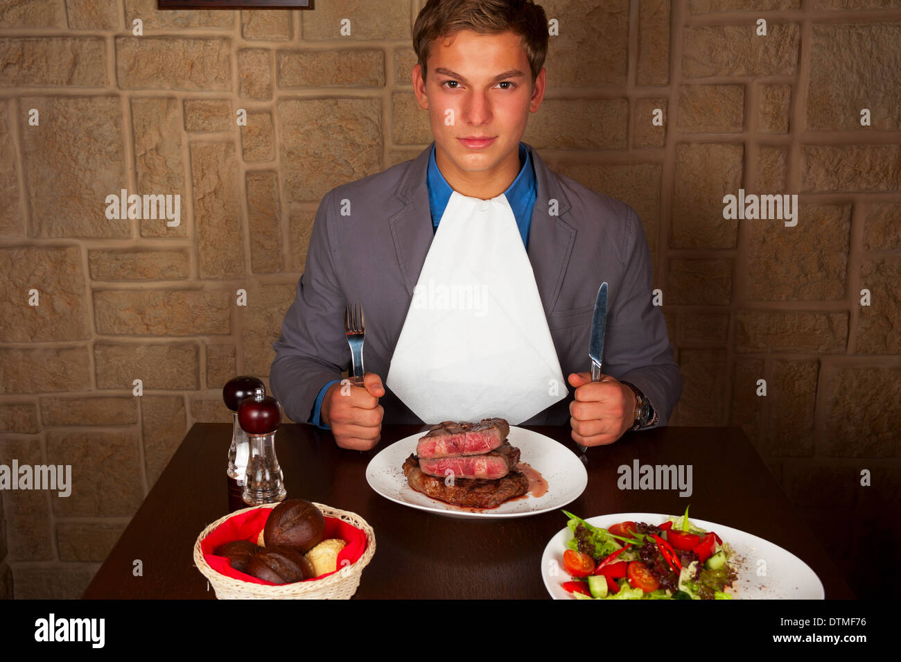 eat a beef steak Stock Photo - Alamy