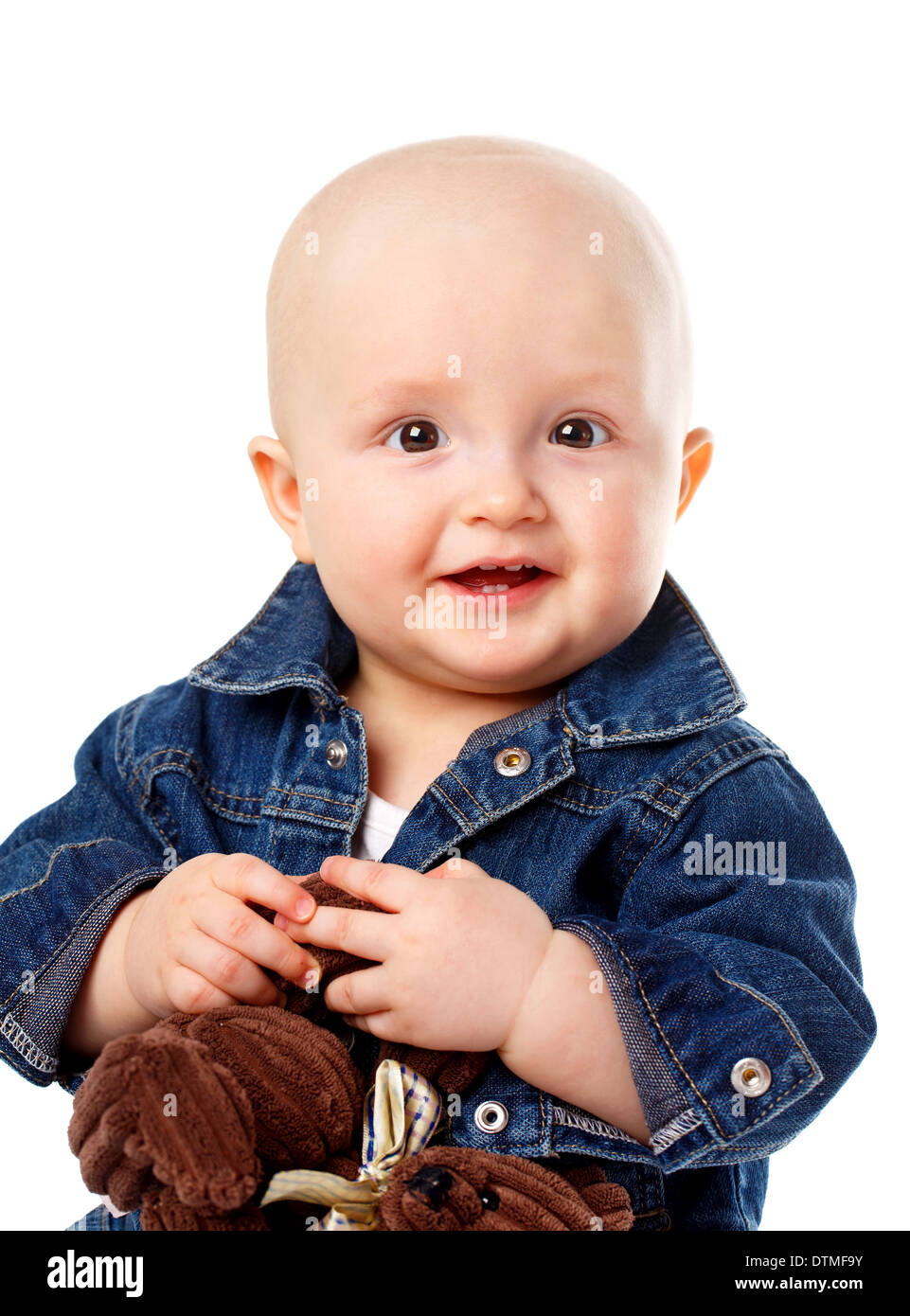 Cute baby boy holding toy bear Stock Photo - Alamy