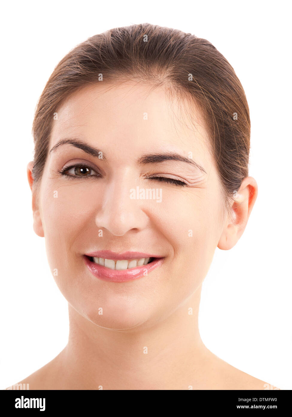 Portrait of a beautiful young woman winking, isolated on white Stock ...