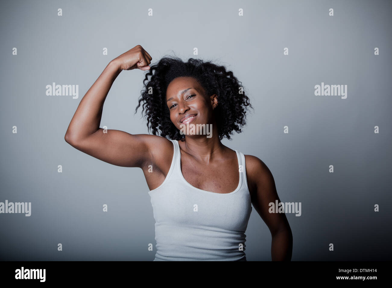 strong black woman in studio having fun dancing and being confident ...