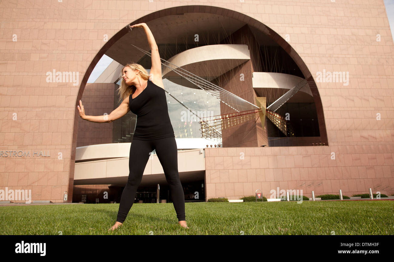 active fit woman poses and stretches Stock Photo - Alamy