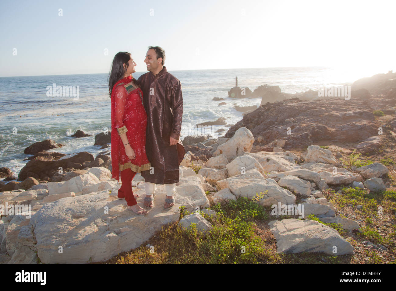 Indian couple walk jump hug hi-res stock photography and images - Alamy