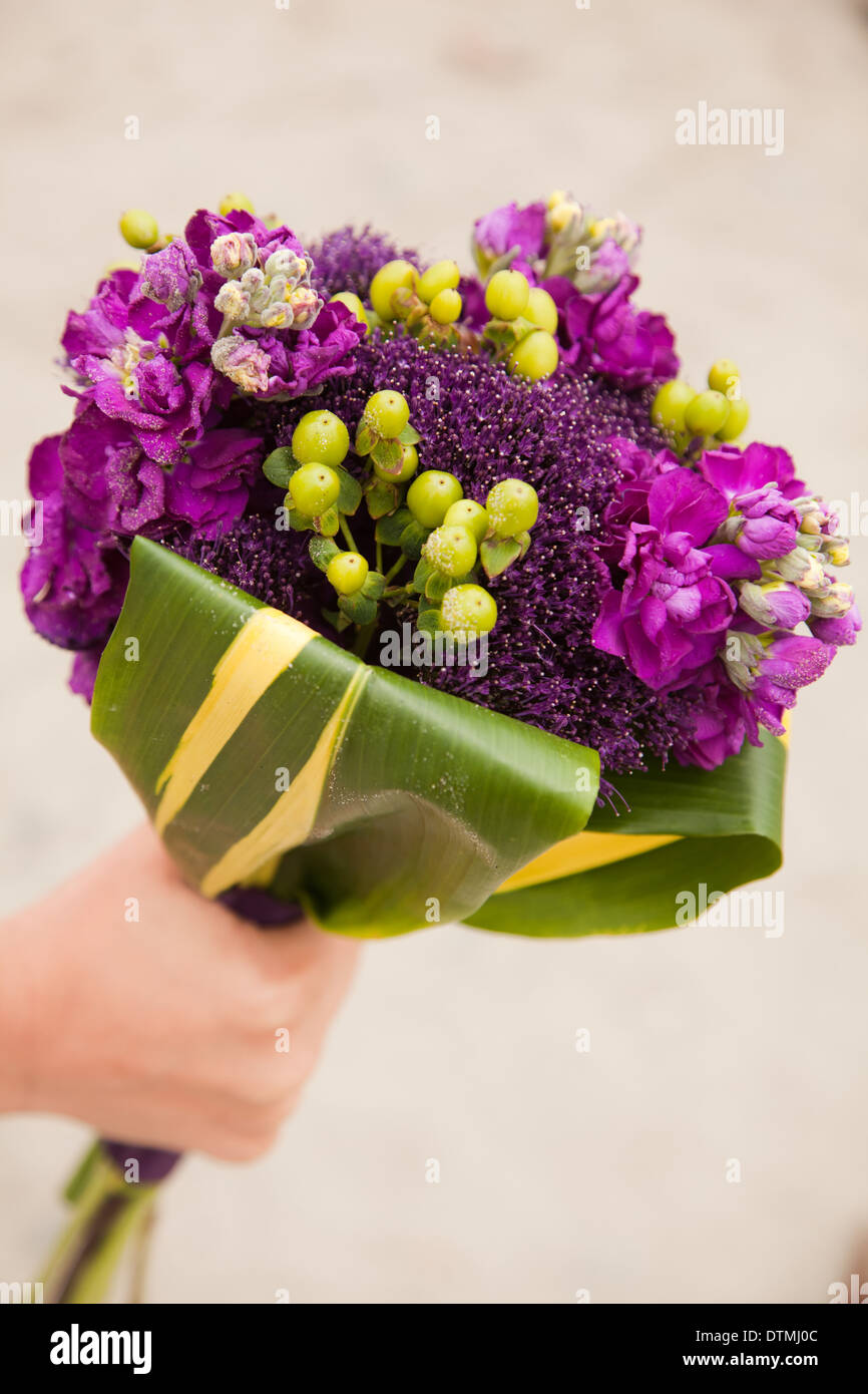 tropical purple and green bouquet Stock Photo - Alamy