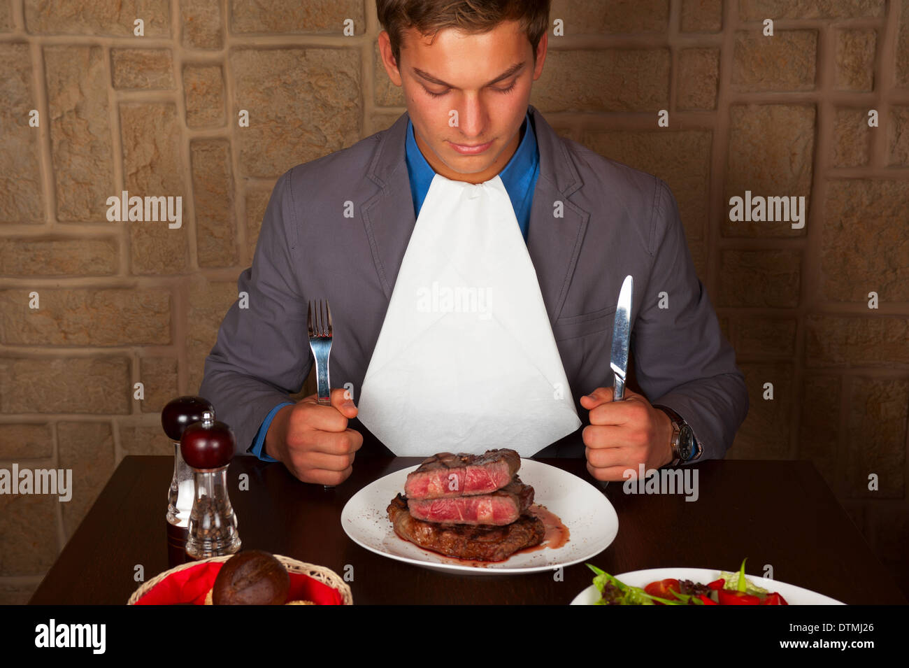 eat a beef steak Stock Photo - Alamy