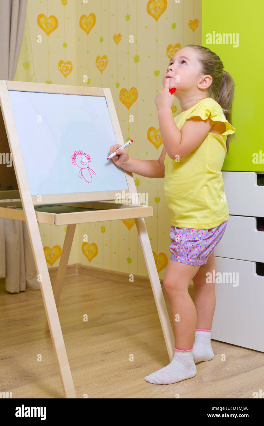 Little girl studies at home Stock Photo - Alamy