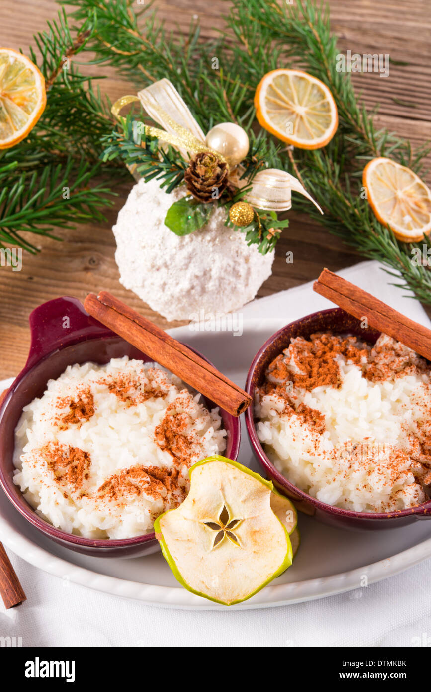 milk rice with cinnamon and applesauce Stock Photo - Alamy