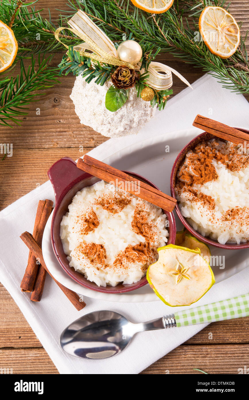 milk rice with cinnamon and applesauce Stock Photo - Alamy