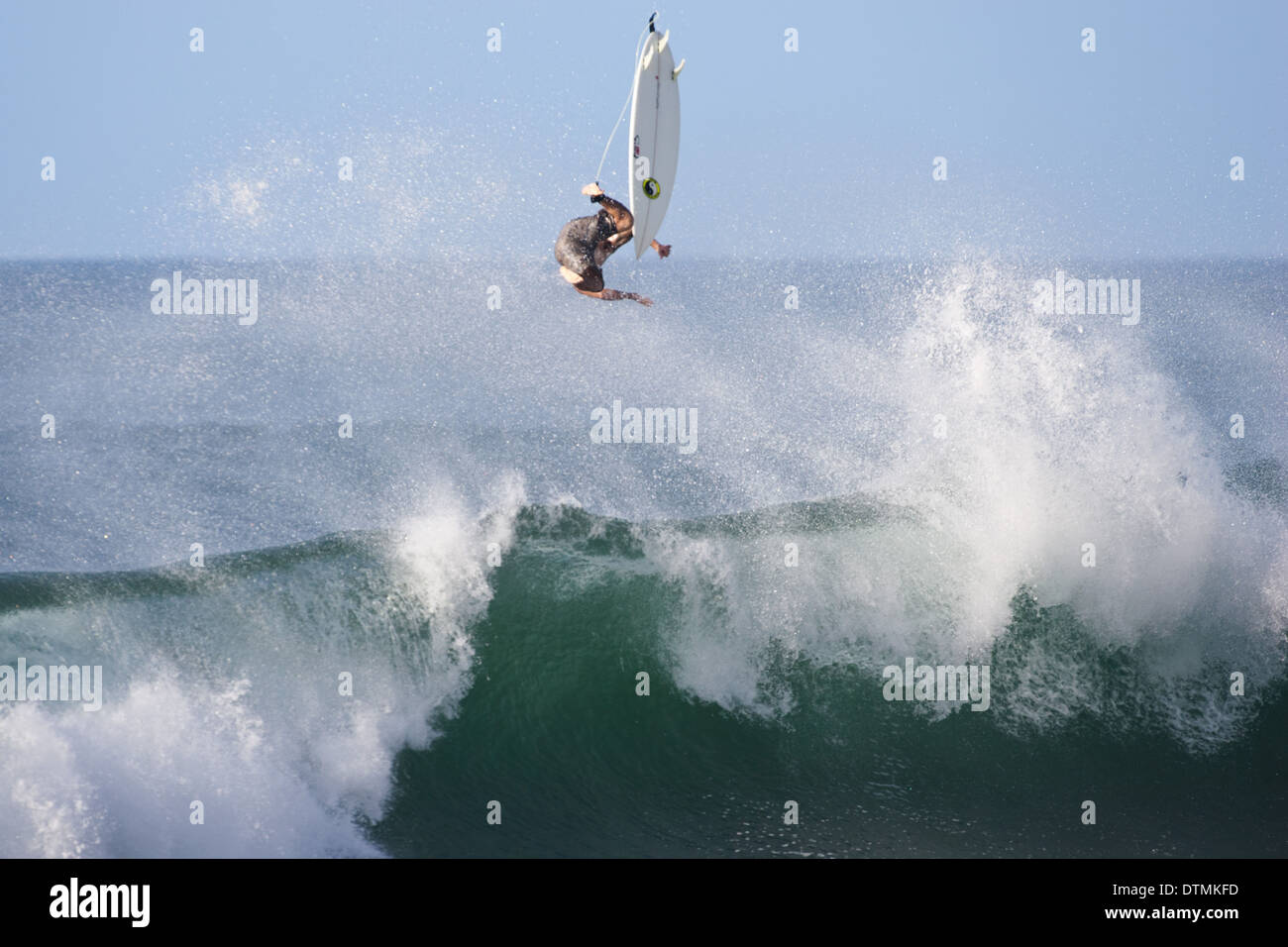 surfer falling flipping taking a dive wave hawaii Stock Photo - Alamy