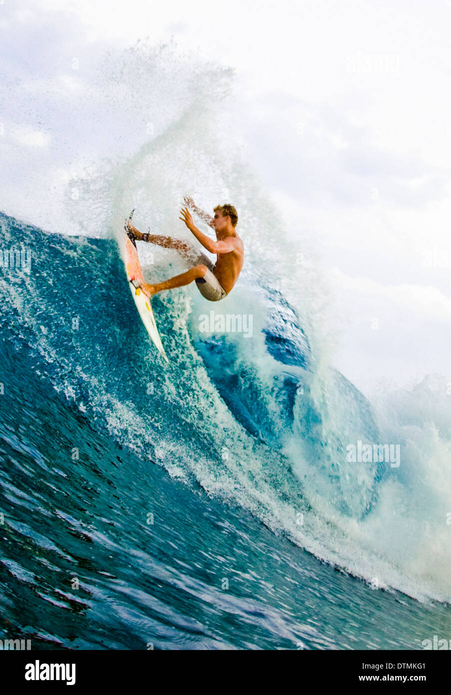 surfer on a surfboard riding a wave in the ocean sea water wave beach ...