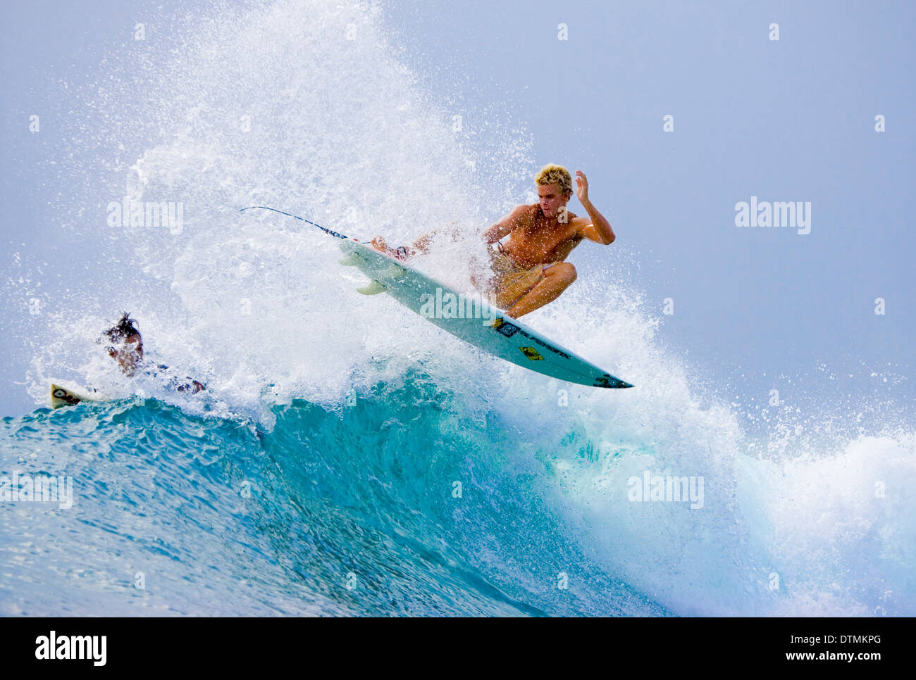 surfer on a surfboard riding a wave in the ocean sea water wave beach ...