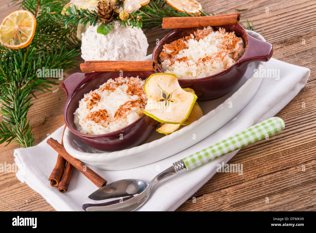 milk rice with cinnamon and applesauce Stock Photo - Alamy