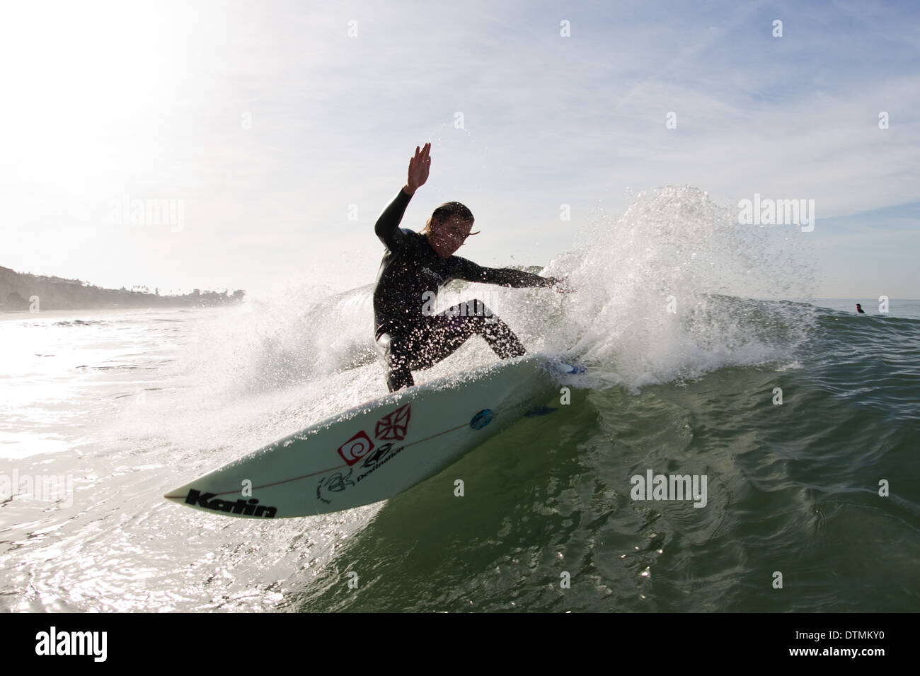 surfer riding a wave in hawaii Stock Photo - Alamy