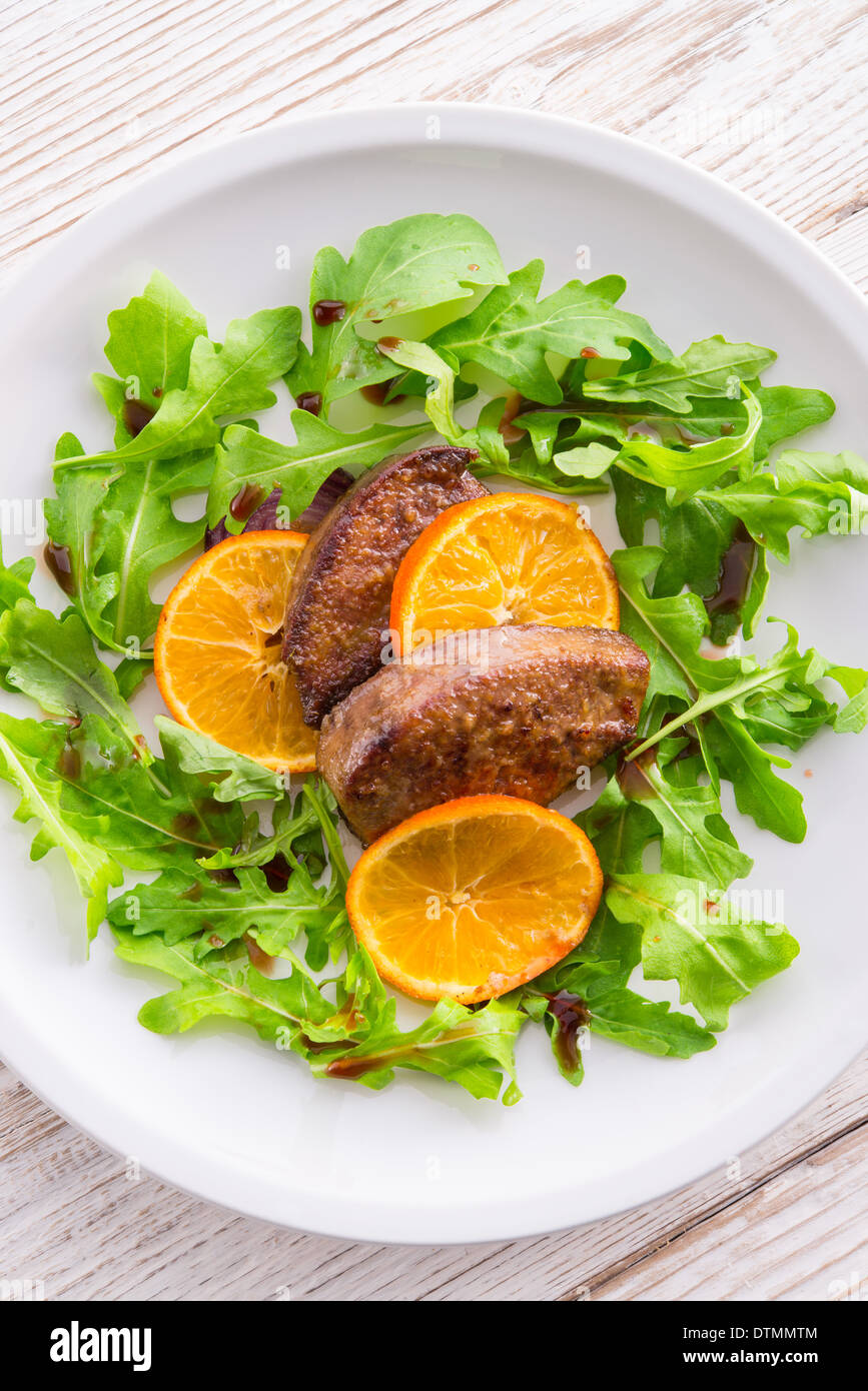 Liver with onion-orange sauce Stock Photo - Alamy