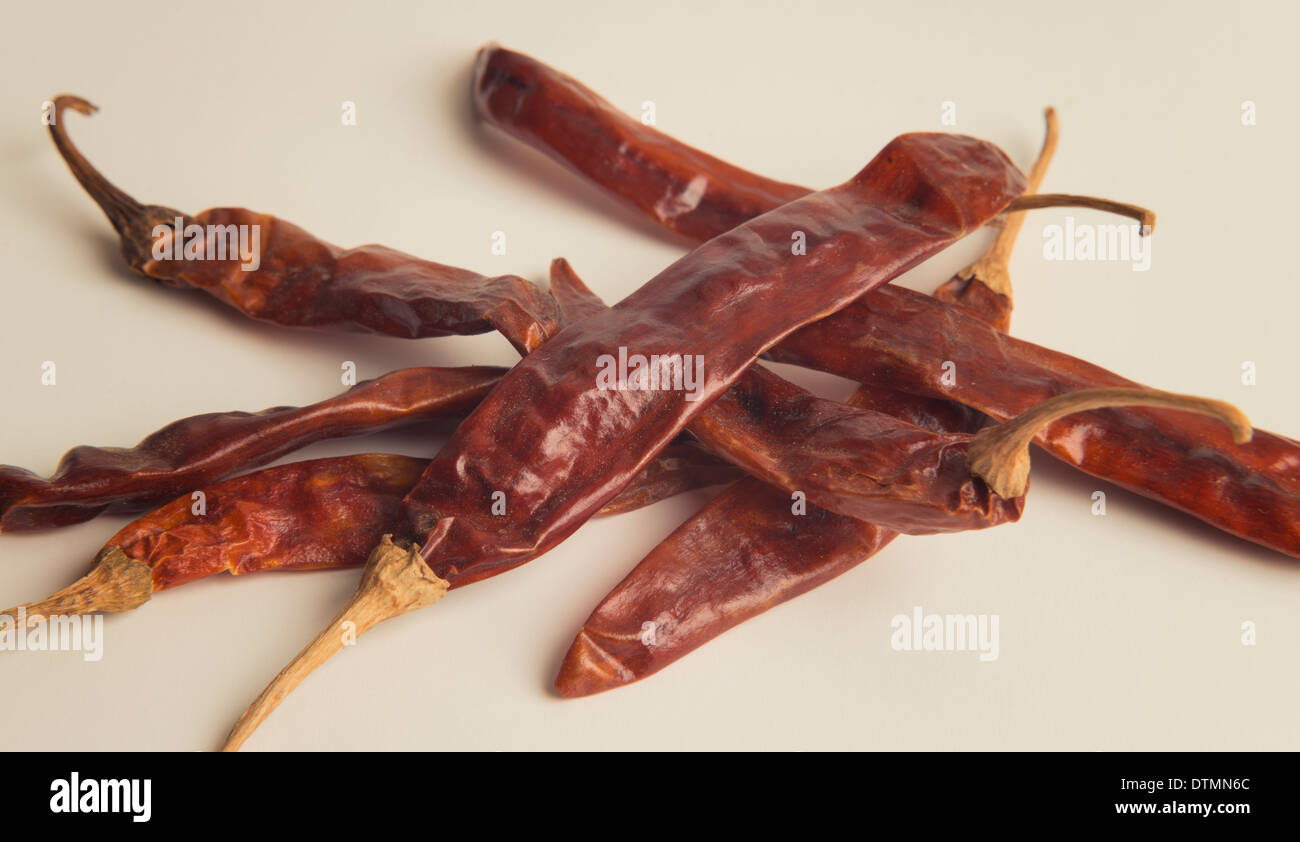 Some dried red chilli peppers Stock Photo - Alamy