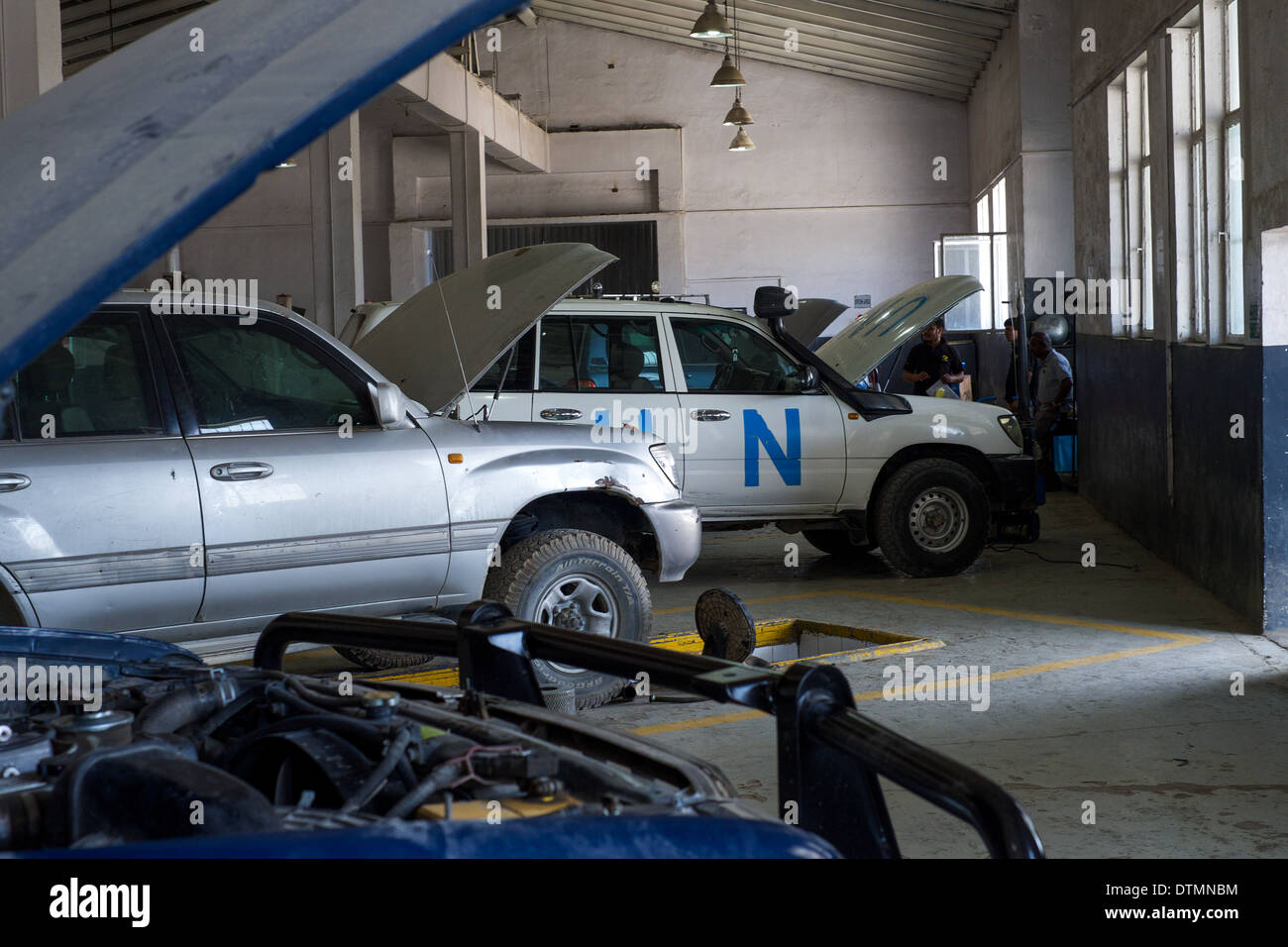 UN vehicles being repaired in Kabul workshop Stock Photo - Alamy