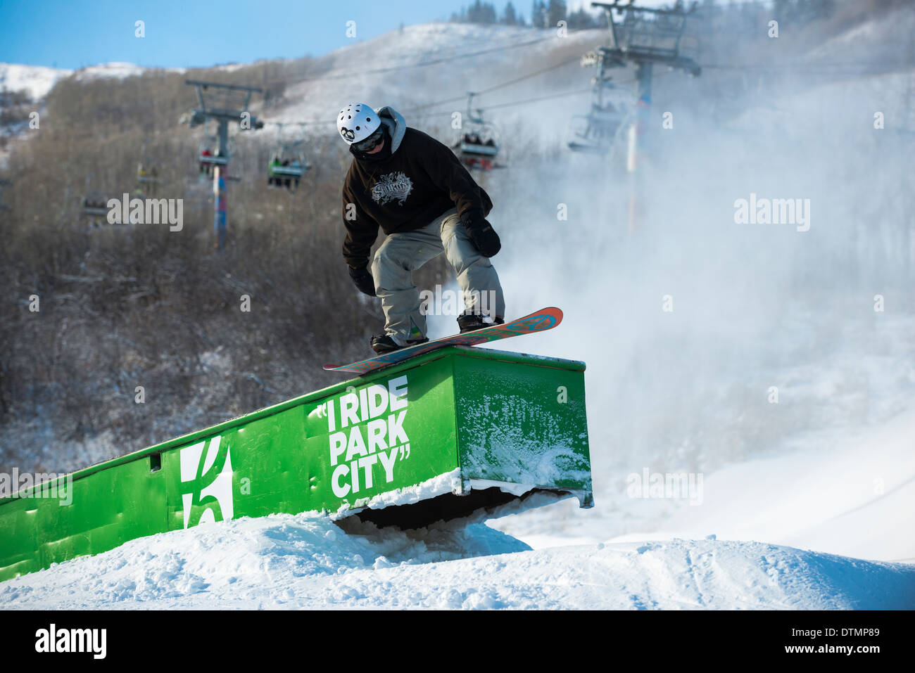 Snowboard jumps on the slopes of the Park City Mountain Resort Stock ...