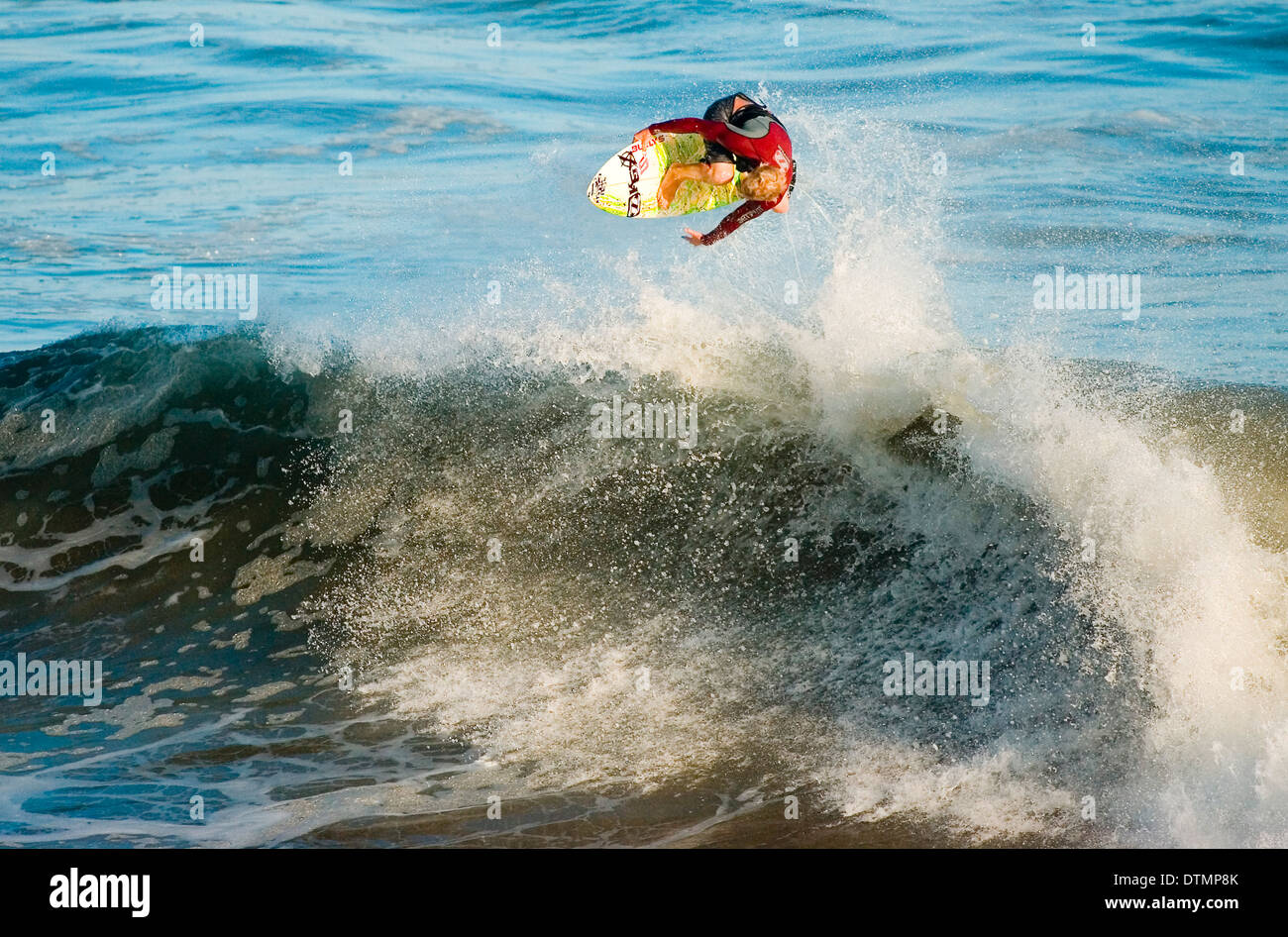 surfer catches some air in the ocean water sea Stock Photo - Alamy
