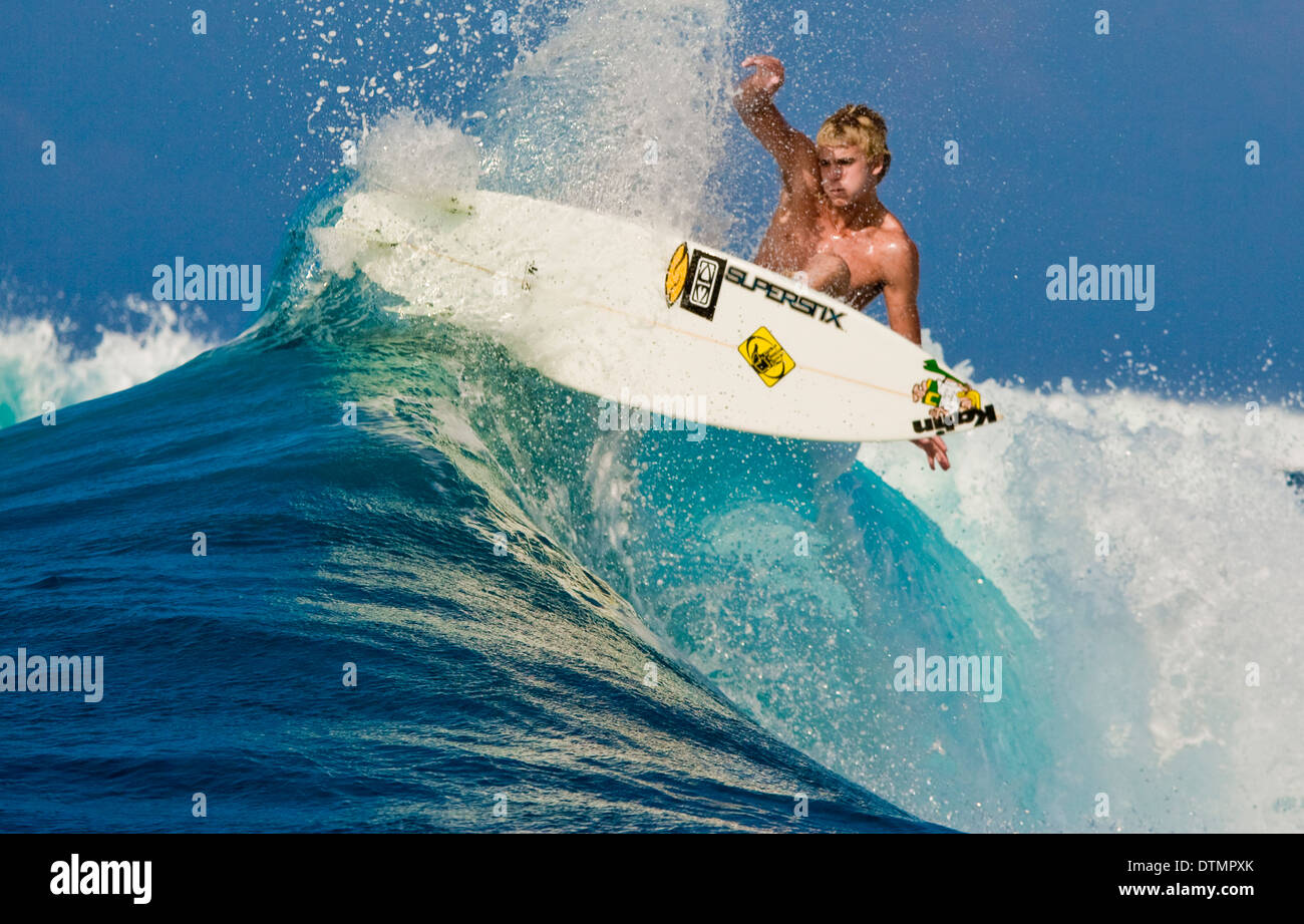 surfer rips through a wave in the ocean sea water wave Stock Photo - Alamy