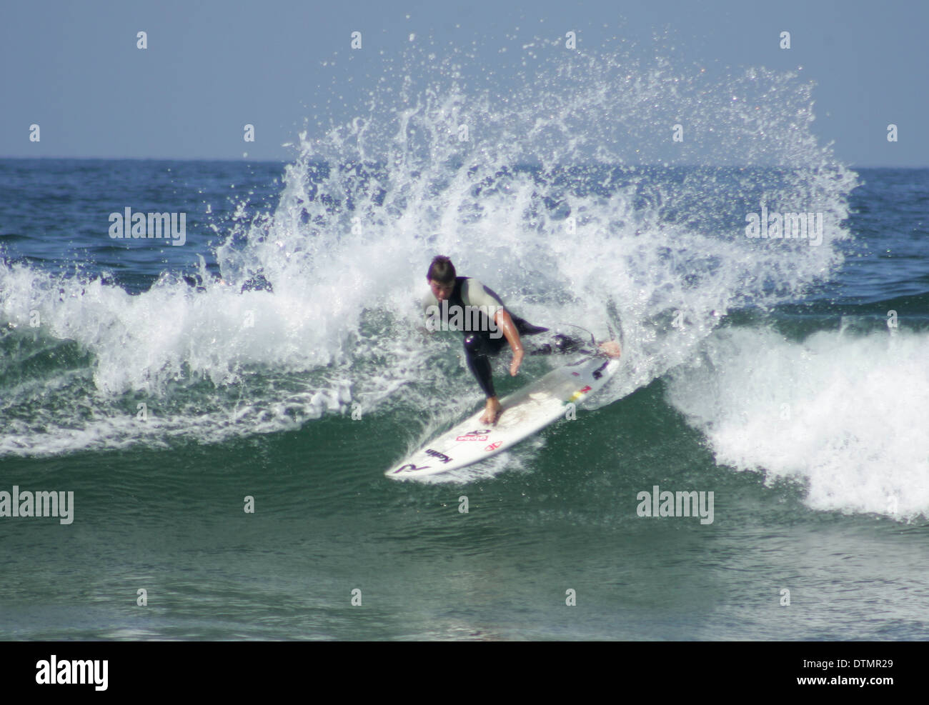 surfer in a wave in the ocean sea water rips through and splashes Stock ...