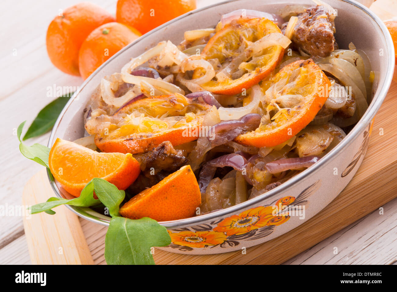Liver with onion-orange sauce Stock Photo - Alamy