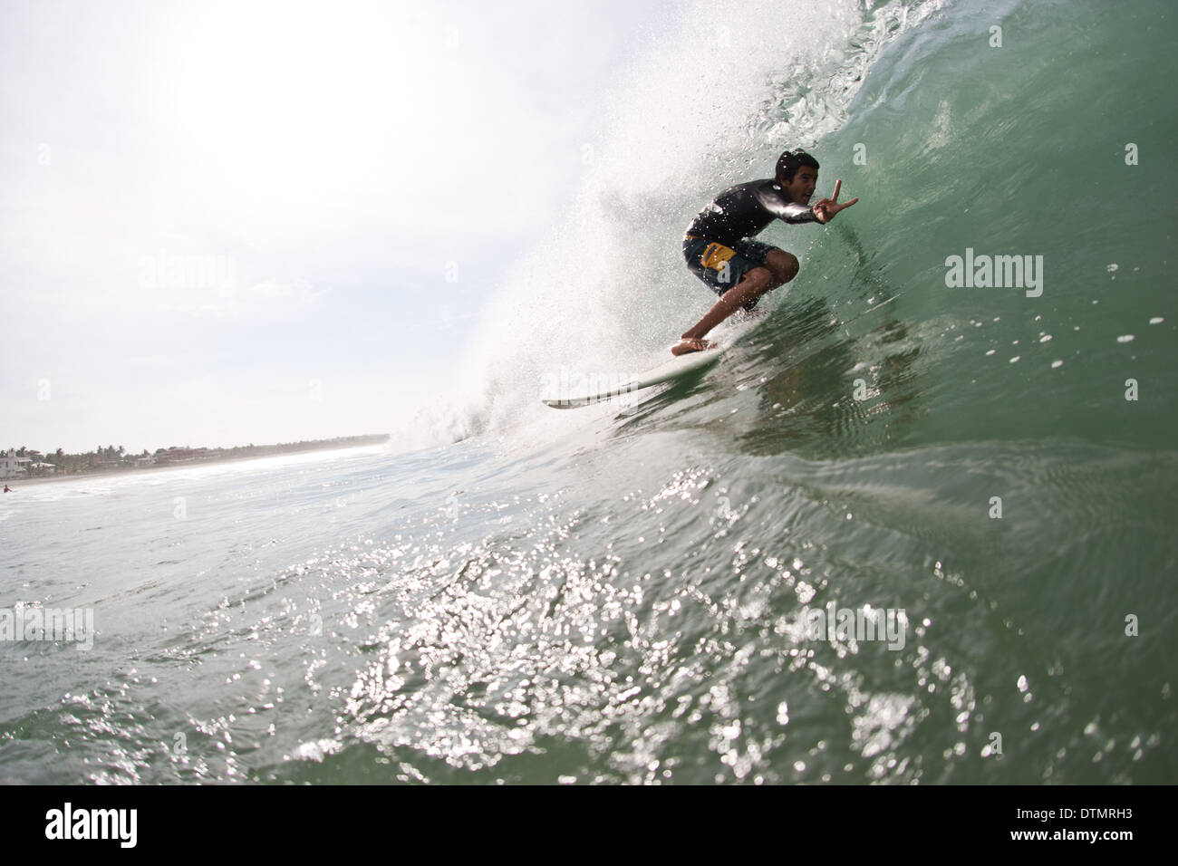 surfer surfing waves in the ocean sea water wave on a surfboard on a ...