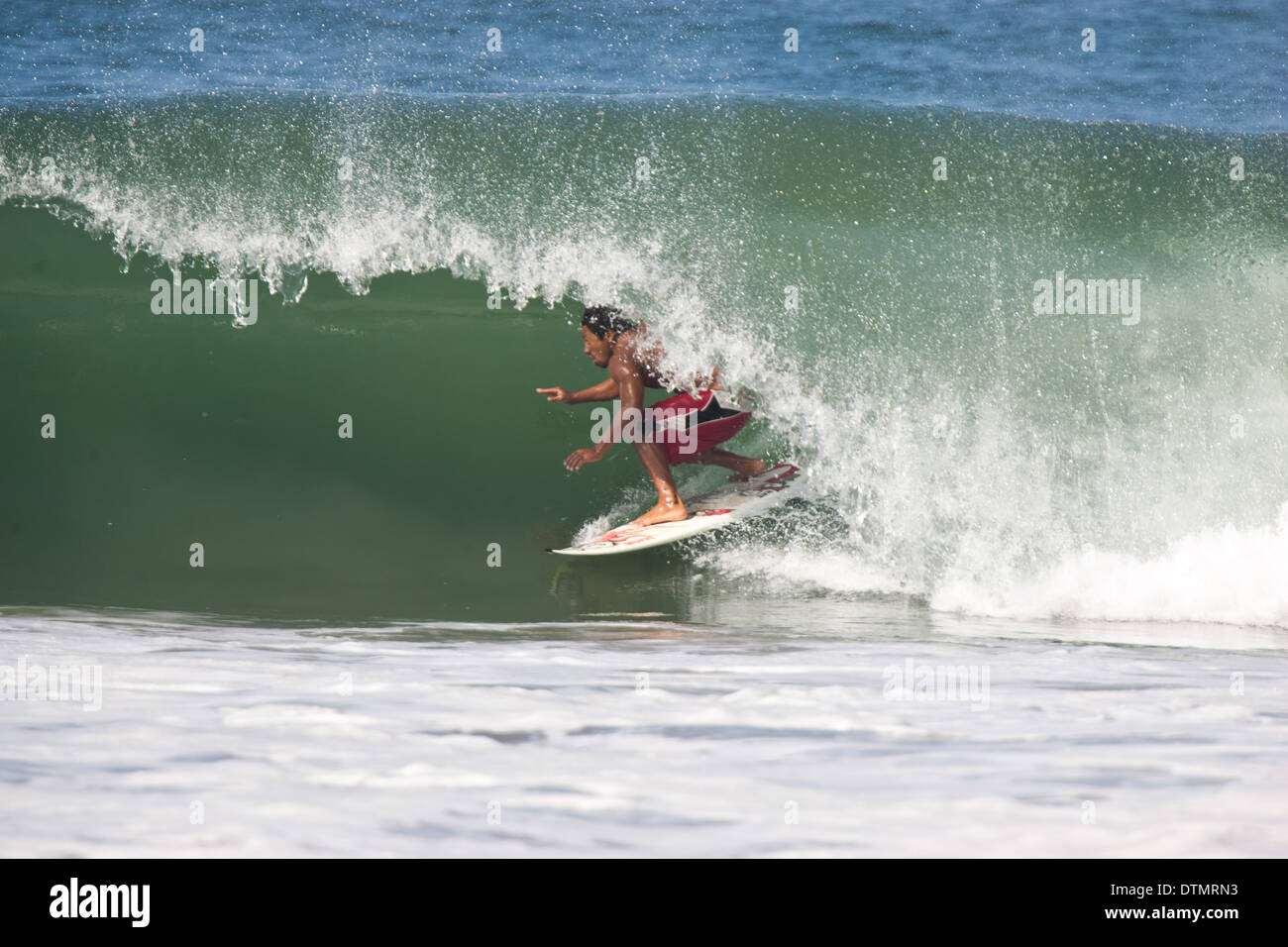 surfer with a surfboard on the beach ocean wave sea water waves Stock ...