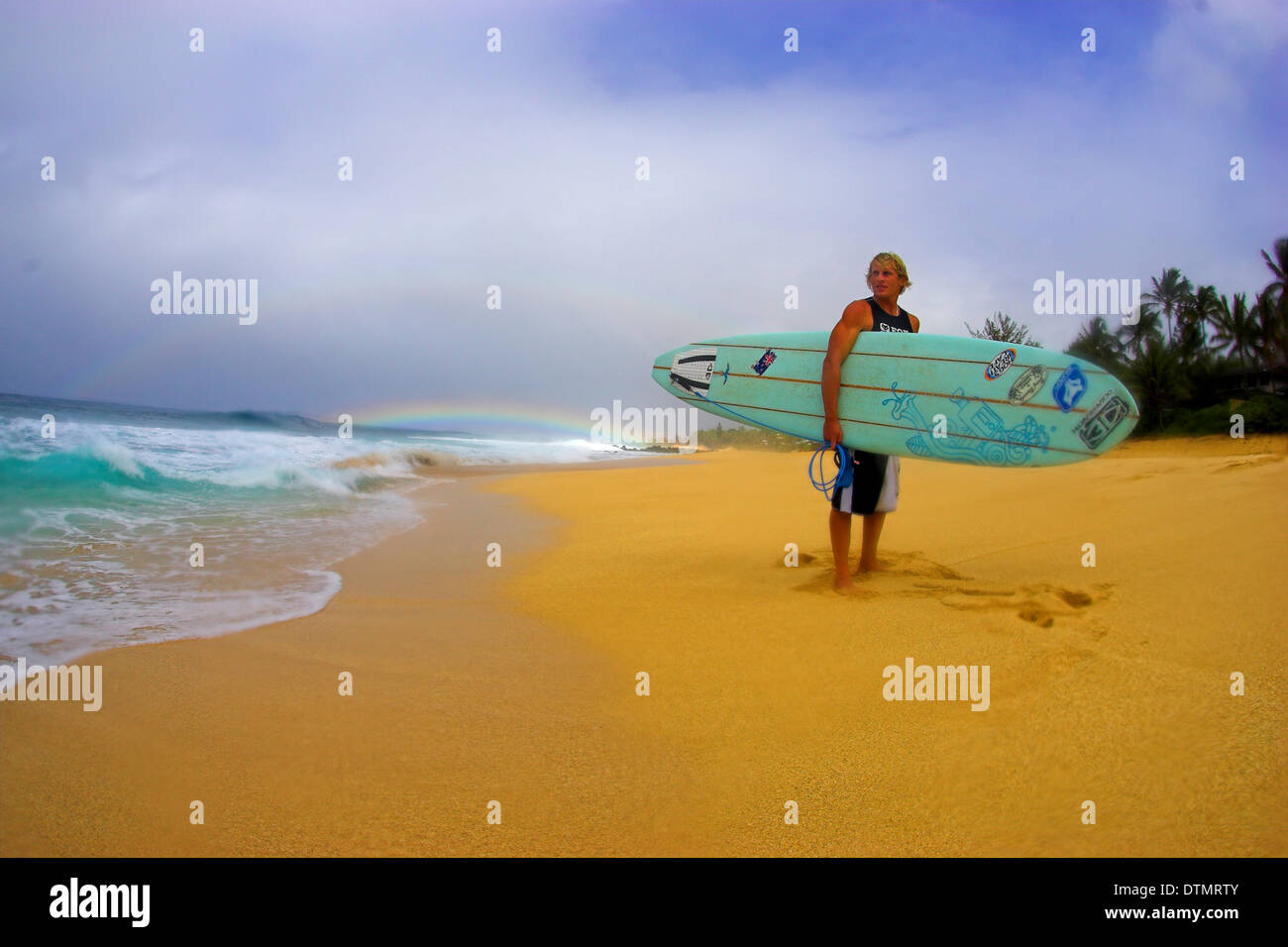 surfer with a surfboard on the beach ocean wave sea water waves Stock ...