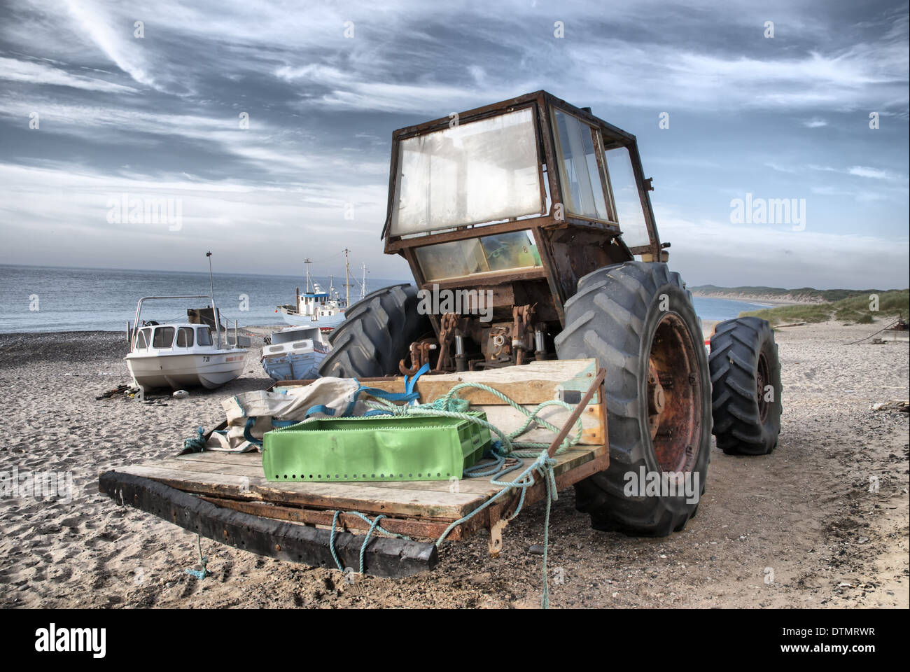 Tractor on the Beach Stock Photo - Alamy