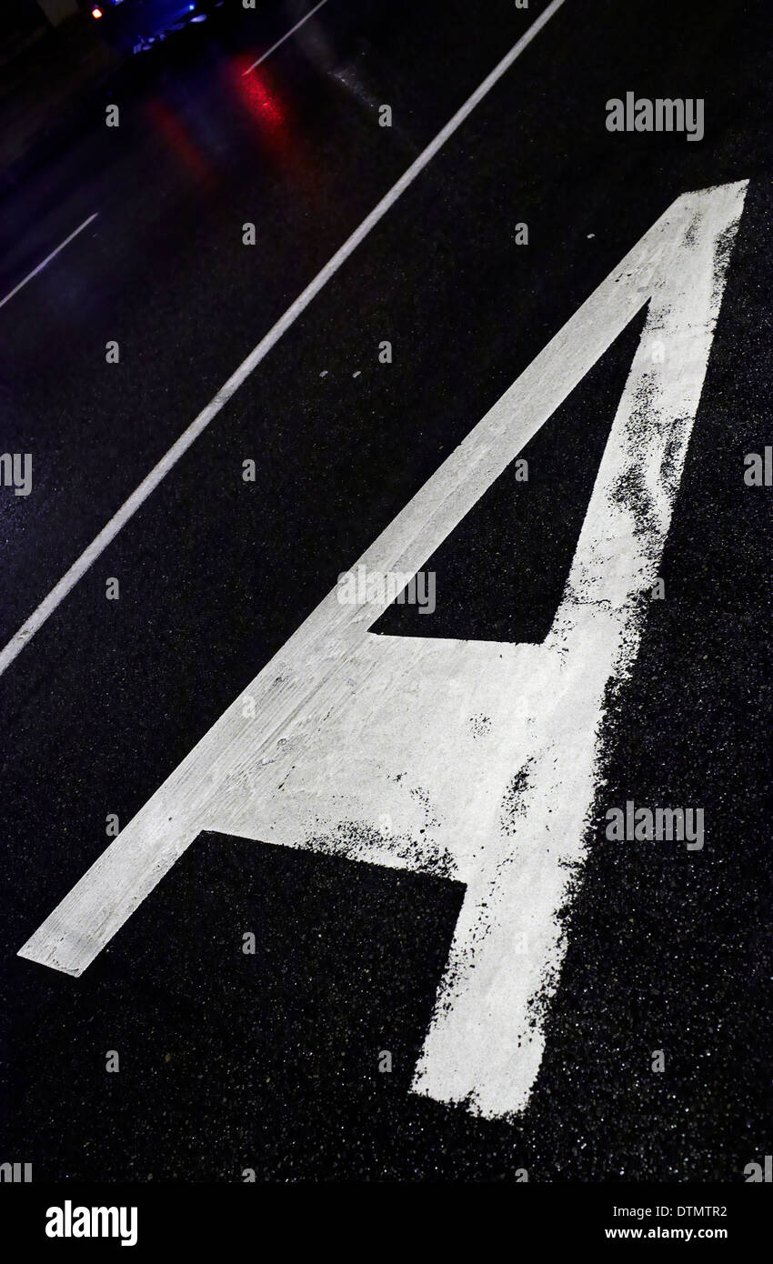 Sign on asphalt Stock Photo - Alamy