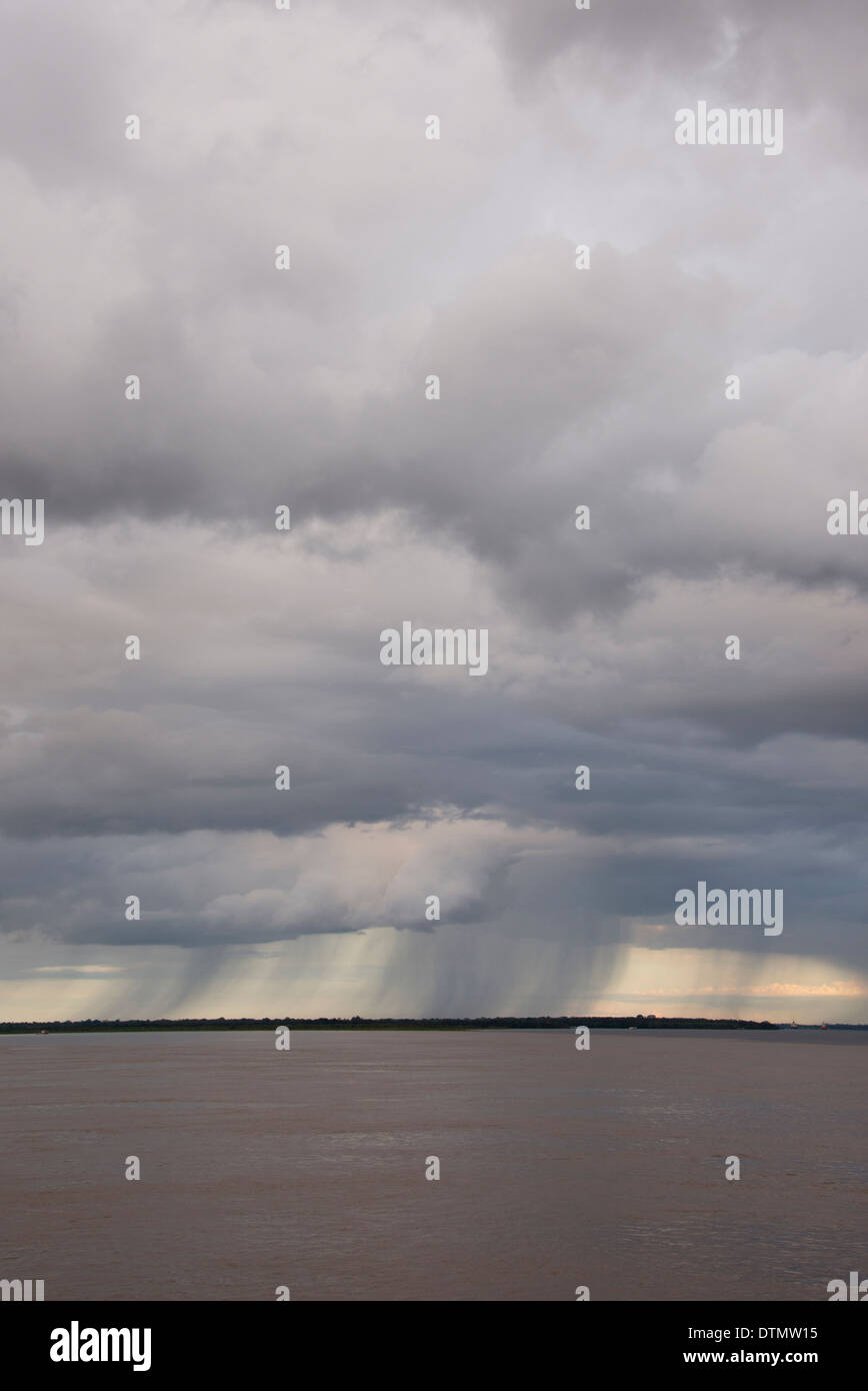 Brazil, Amazon River near Manaus. Typical rainstorm during the wet ...