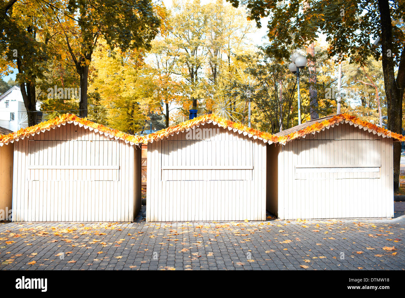 Three small wooden houses Stock Photo - Alamy