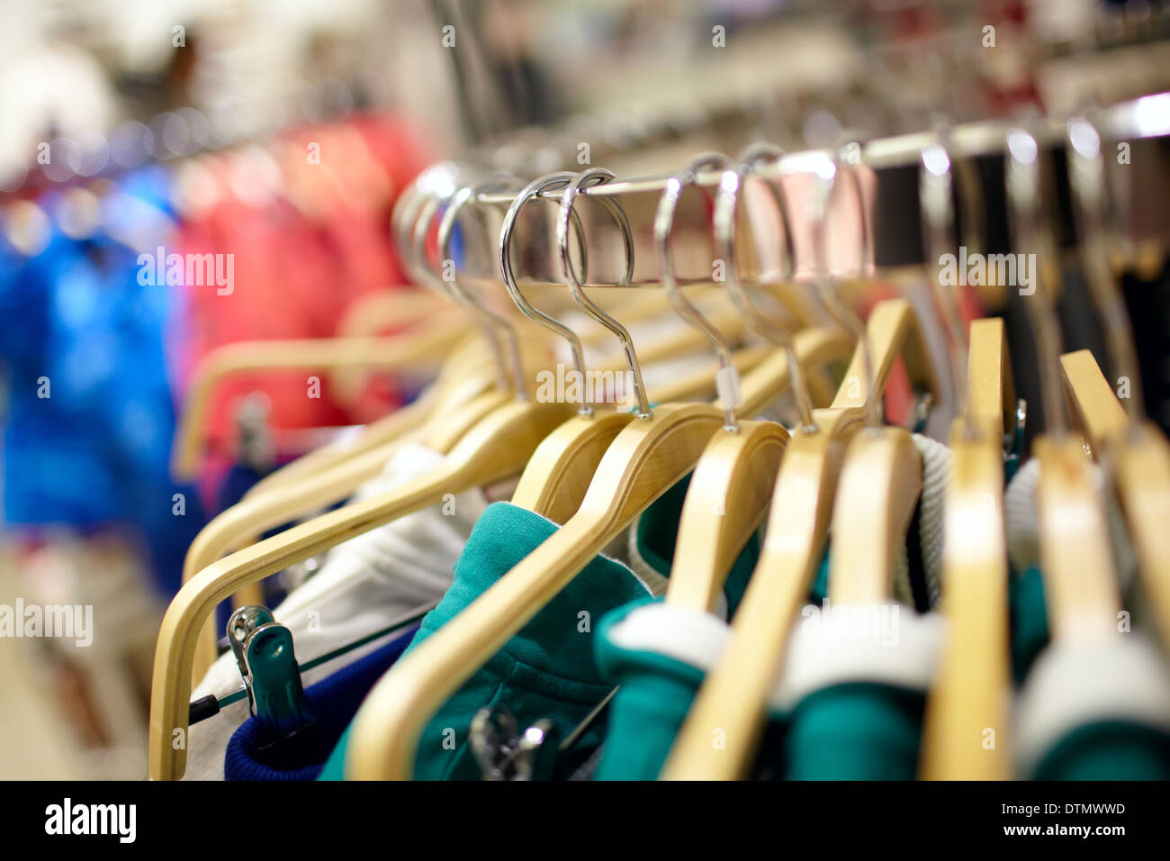 Hangers in the clothing store Stock Photo - Alamy