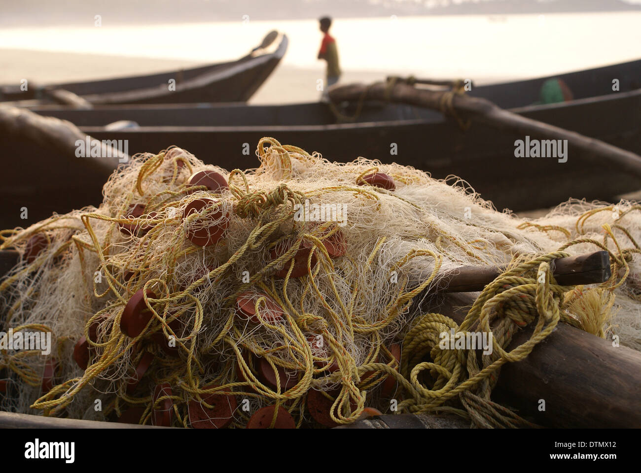 Handmade fish net on a wooden boat Stock Photo - Alamy