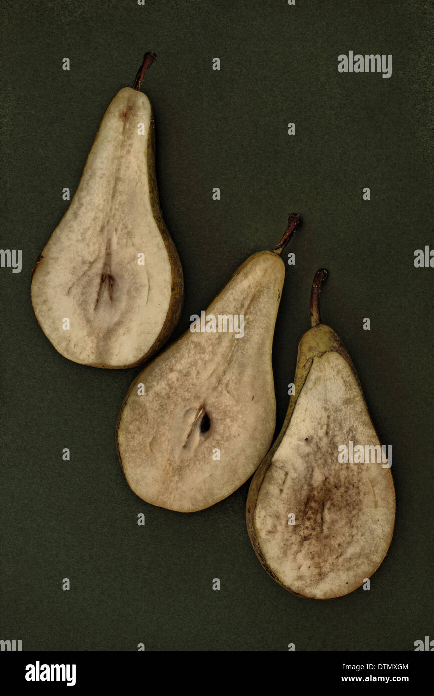 Three halves of pears Stock Photo - Alamy