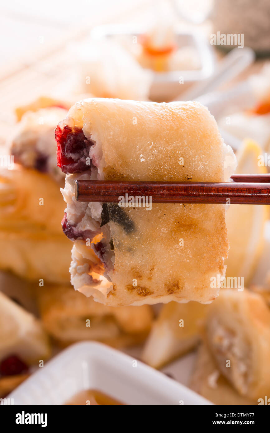 Sweet spring rolls Stock Photo - Alamy