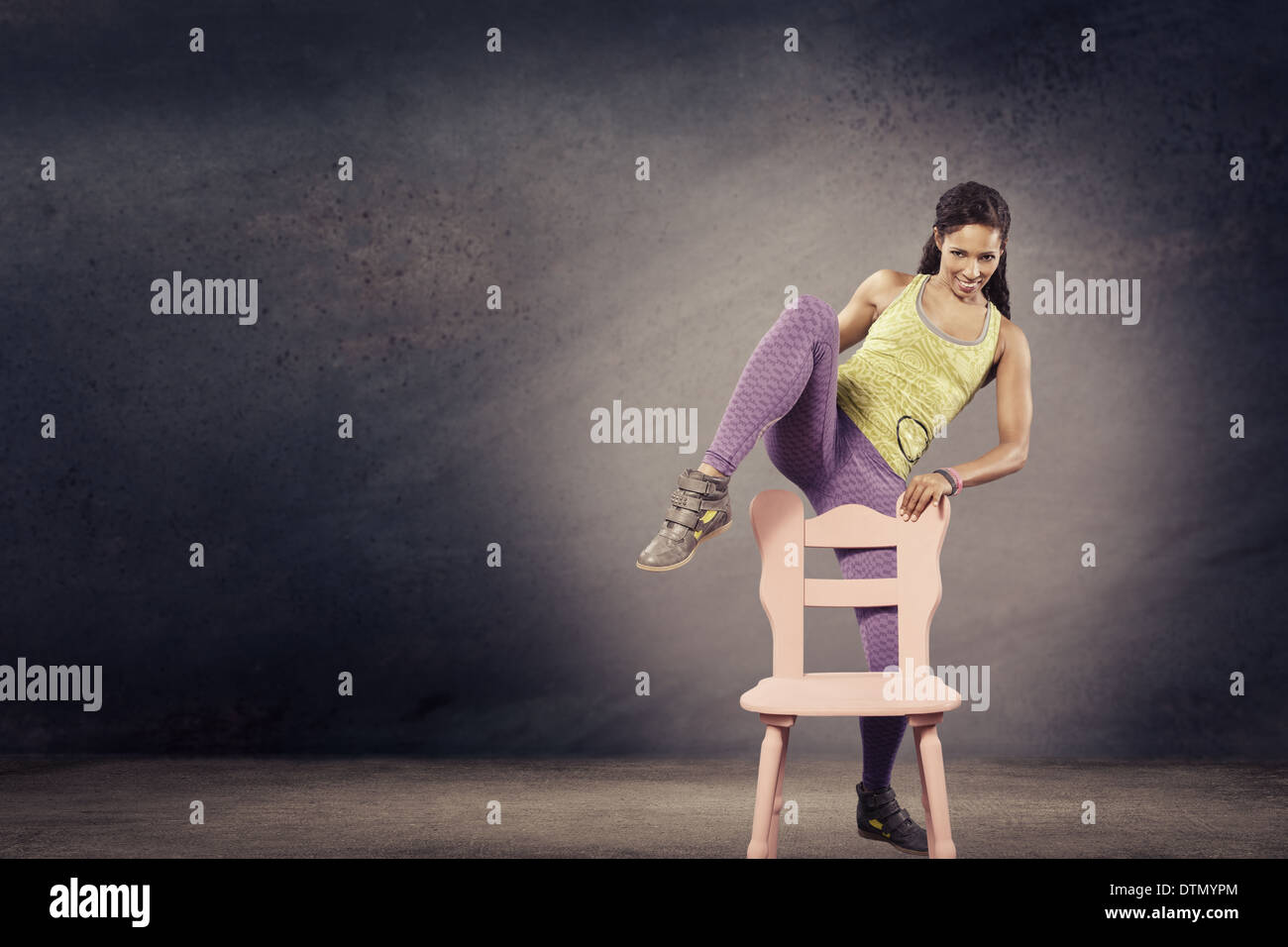 Exercising with chair in gym hi-res stock photography and images - Alamy