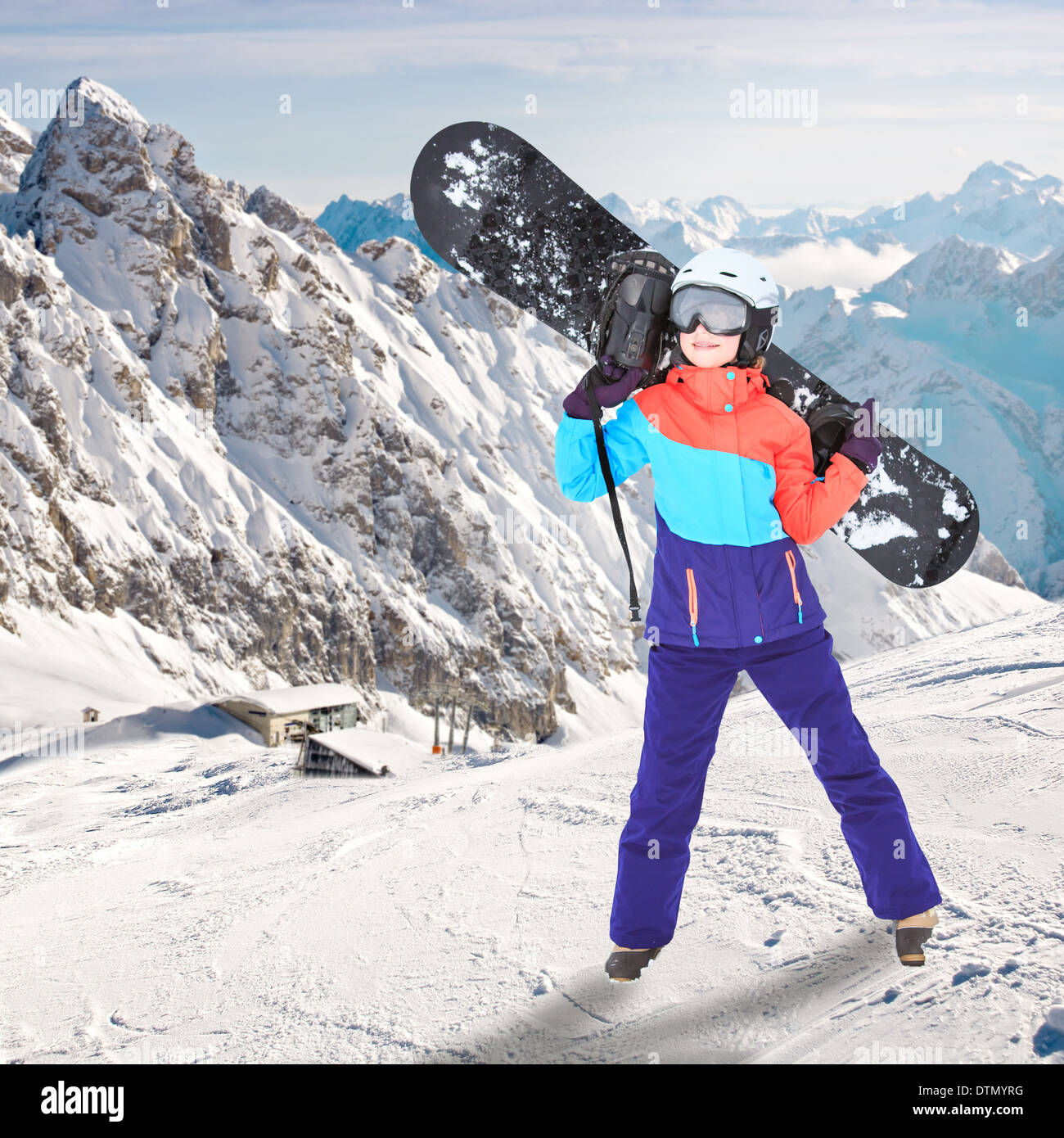 a teenage girl snowboarding in the Alps Stock Photo - Alamy