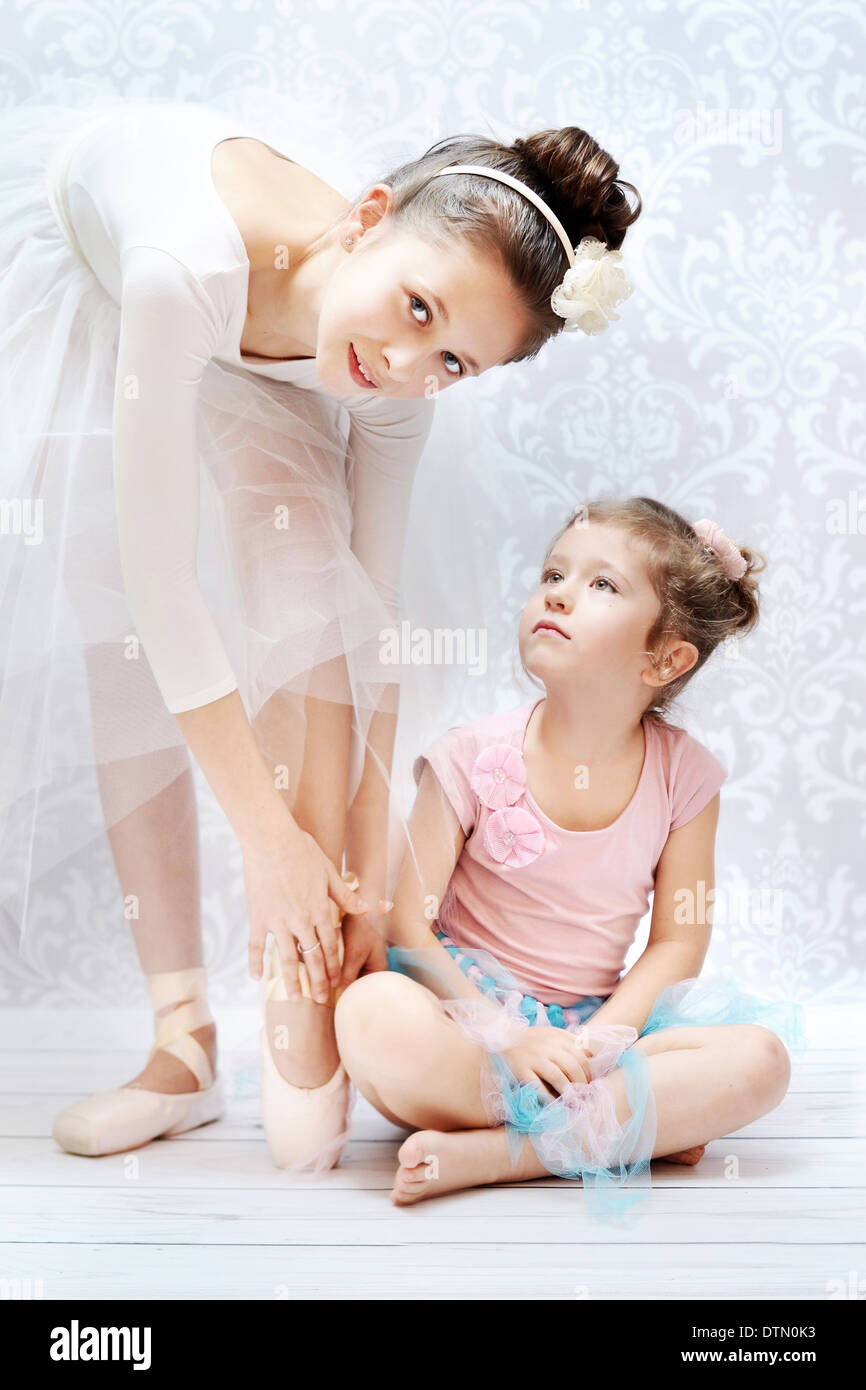 Two cute sisters practising ballet dance Stock Photo - Alamy