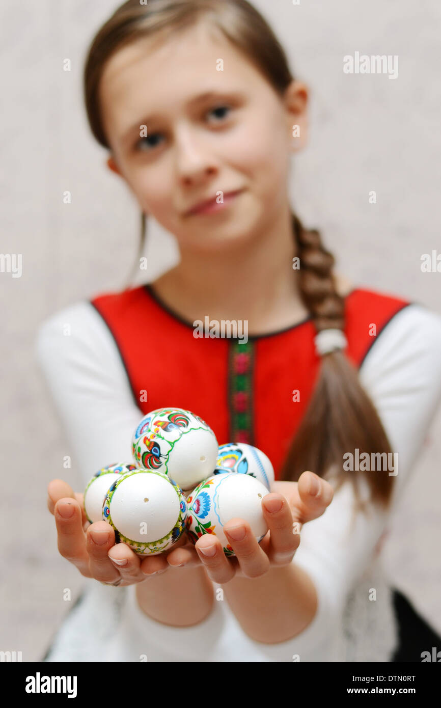 Young cute girl wearing local traditional costume Stock Photo - Alamy