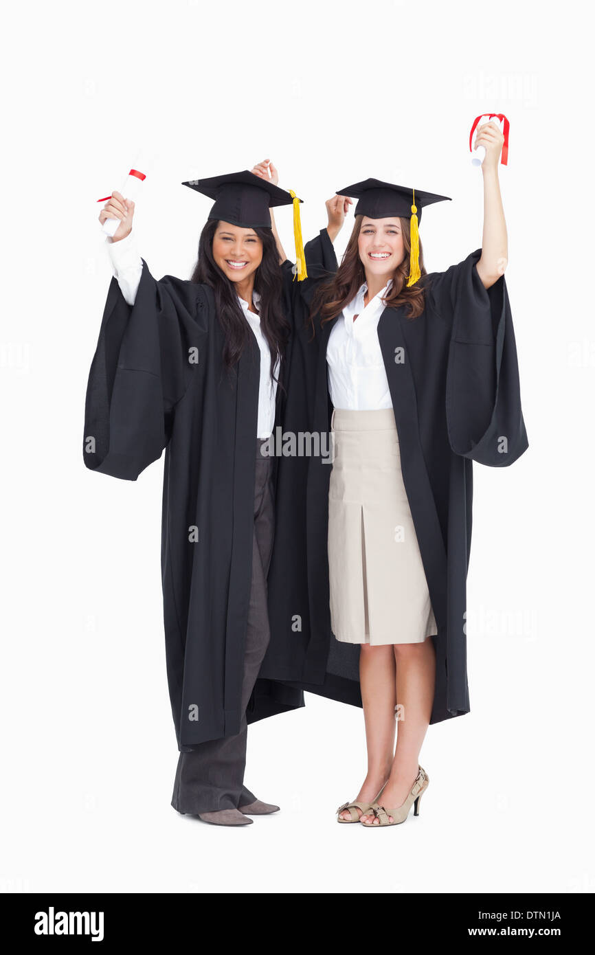 Two women celebrating their graduation Stock Photo - Alamy
