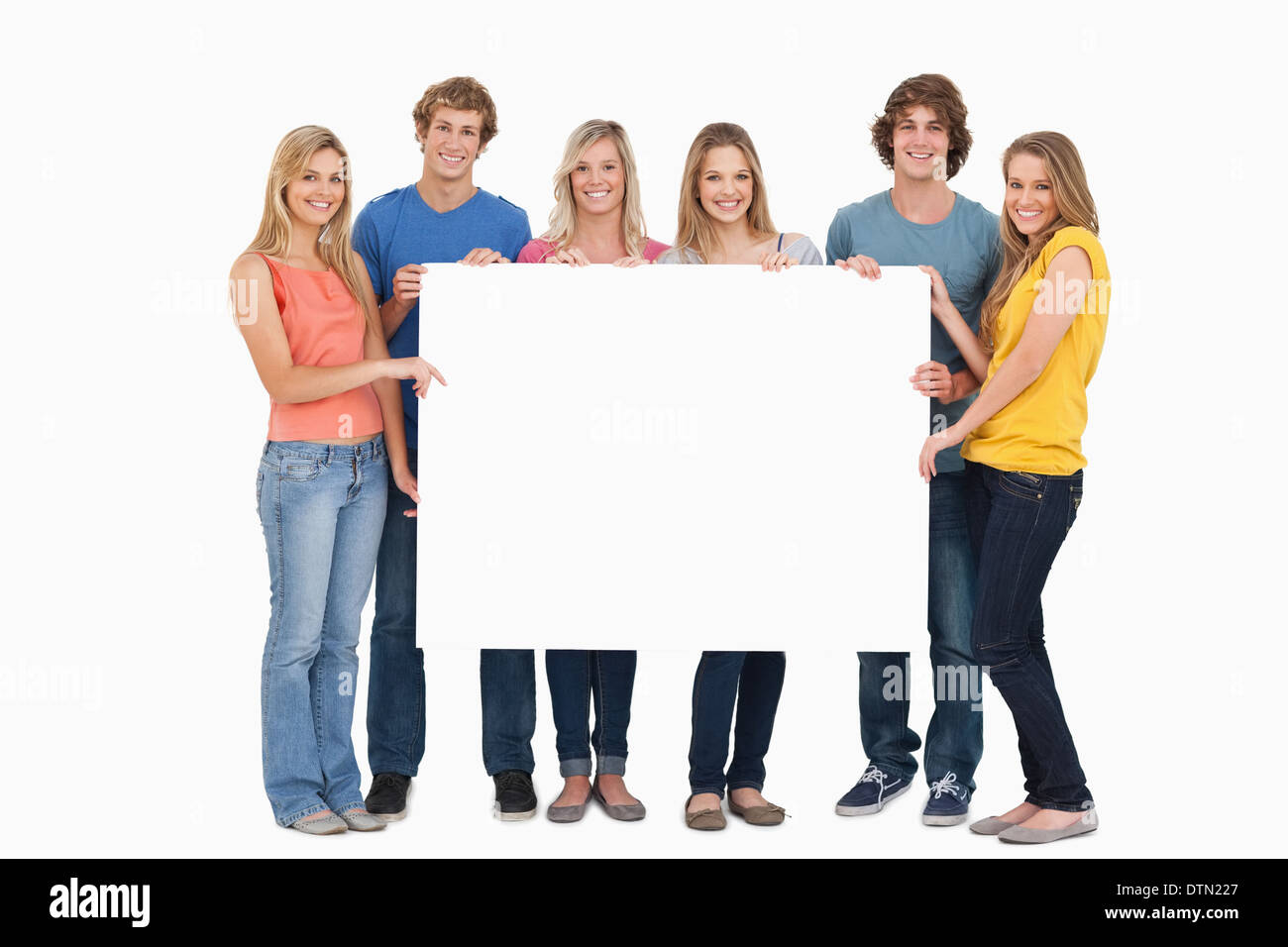 A group of people holding blank sheet Stock Photo - Alamy
