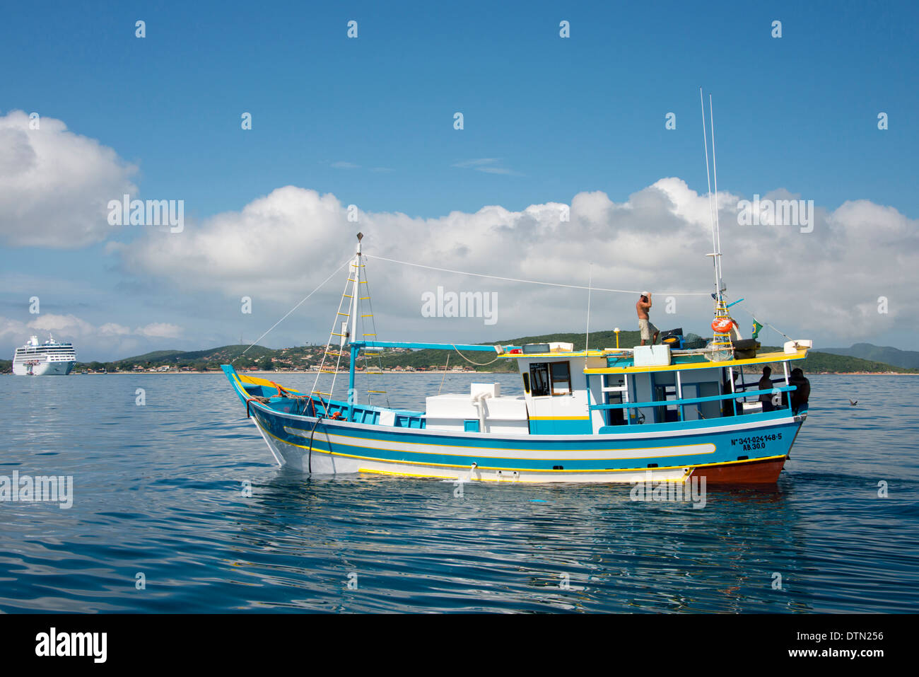 Brazil, Rio de Janeiro, Buzios. Local fishing boat off the coast of ...