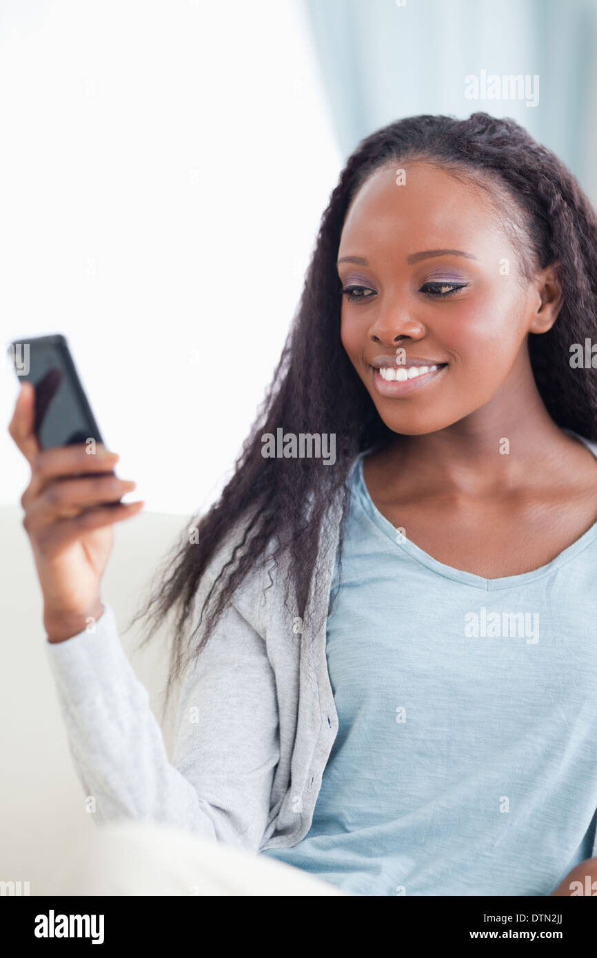 Close up of woman reading text message Stock Photo - Alamy