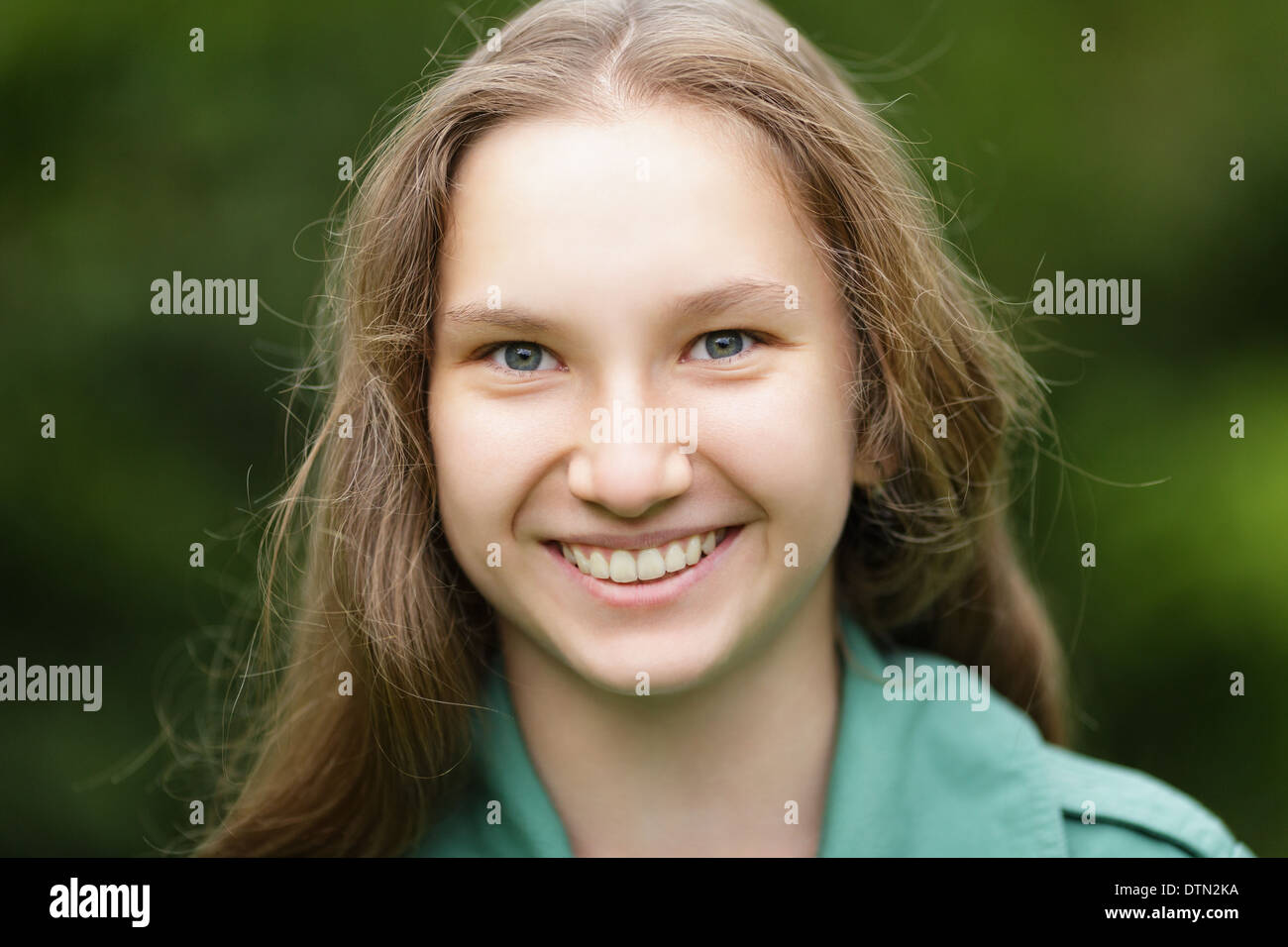 teenage girl widely smile to camera, close up portrait Stock Photo - Alamy