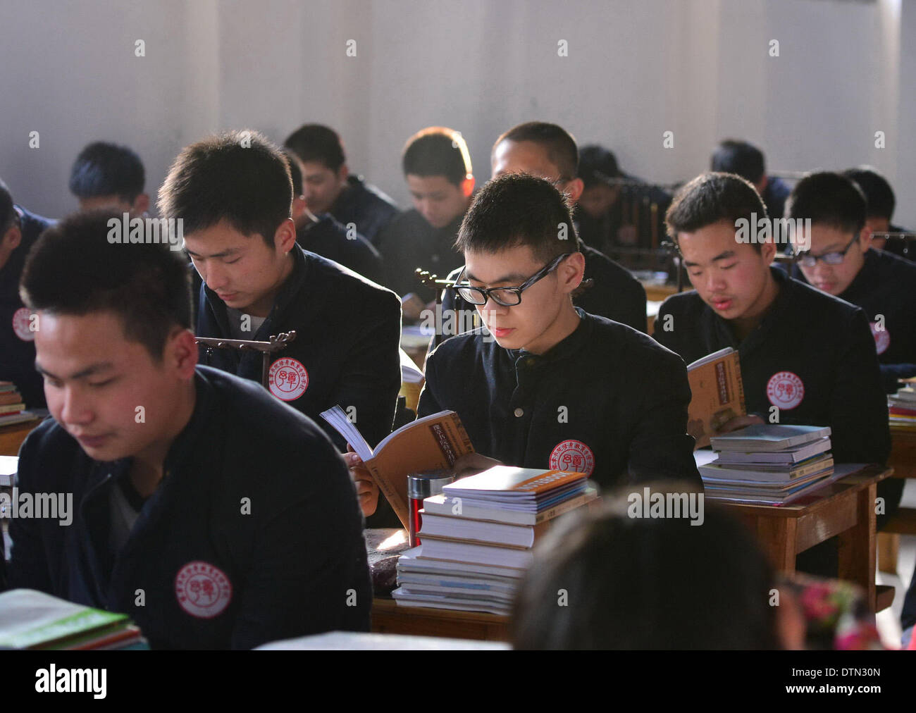 Nanchang, China. 21st Feb 2014. Students attend class at Yuzhang ...