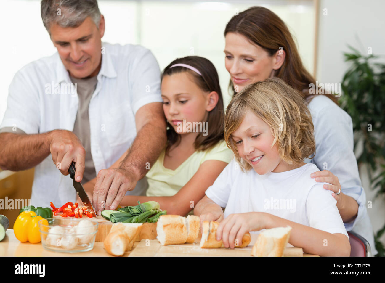 Family making sandwiches Stock Photo - Alamy