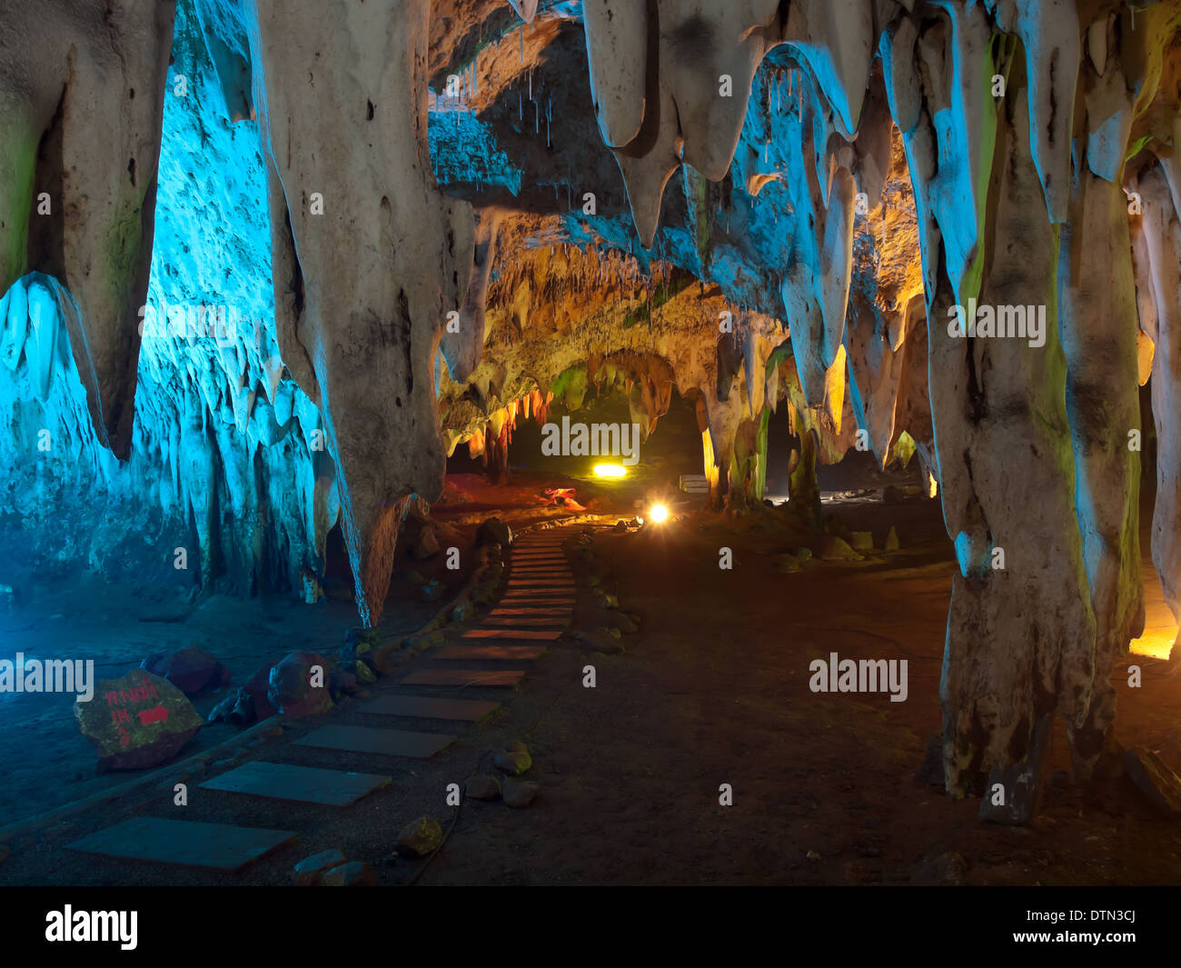 Stalactite wall illuminated with color light Stock Photo - Alamy